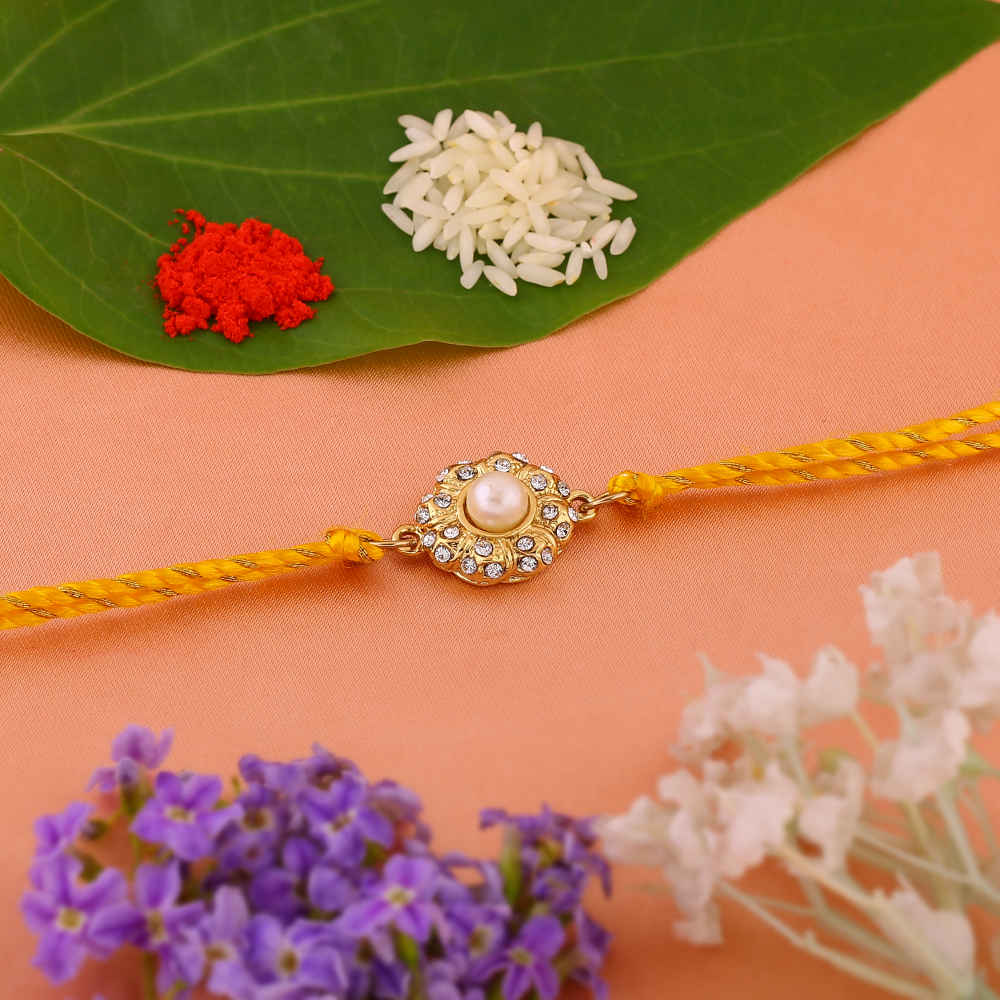 Estele Gold Plated Moonlight Pearl Floral Rakhi with Austrian Crystals ...