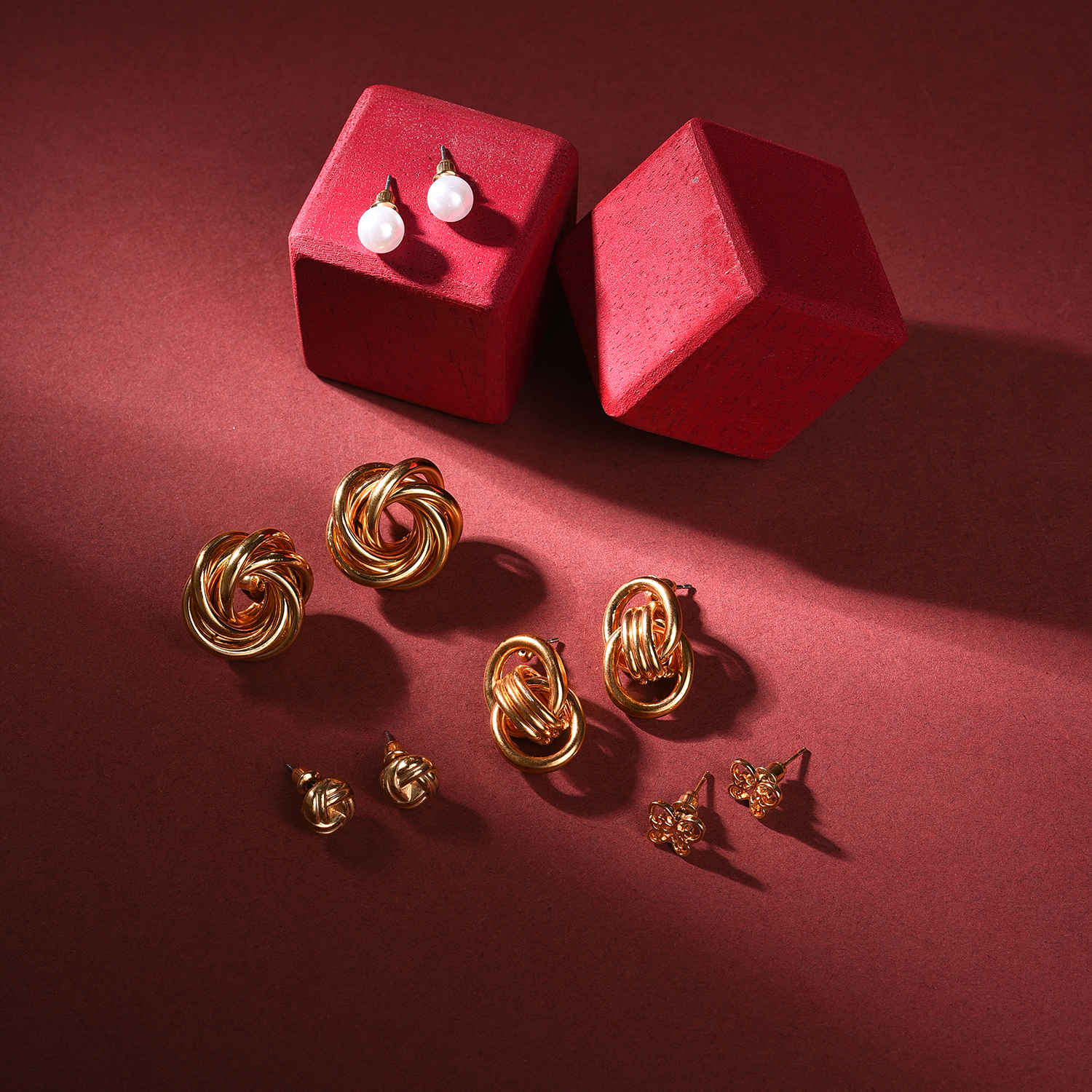 SOHI Gold-Toned Contemporary Studs Earrings