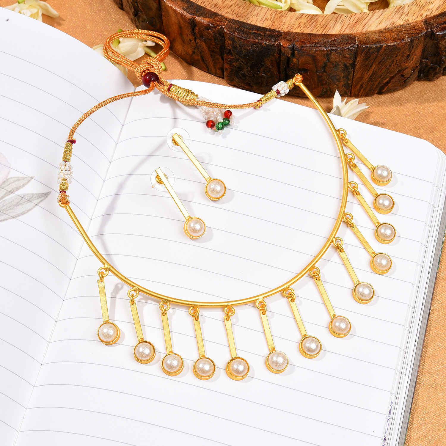 SOHI Gold Plated Pearl Studded Taselled Jewellery Set