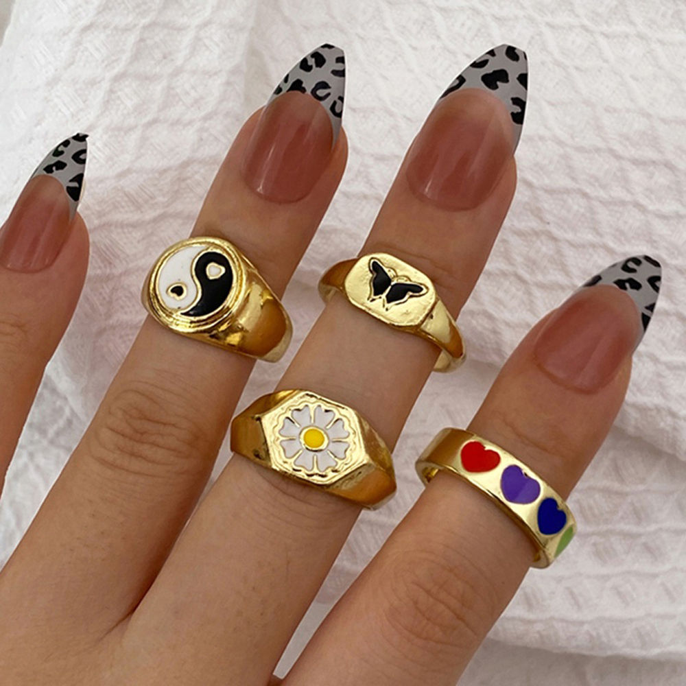 Jewels Galaxy Set of 4 Gold-Plated Black White Stackable Finger Ring