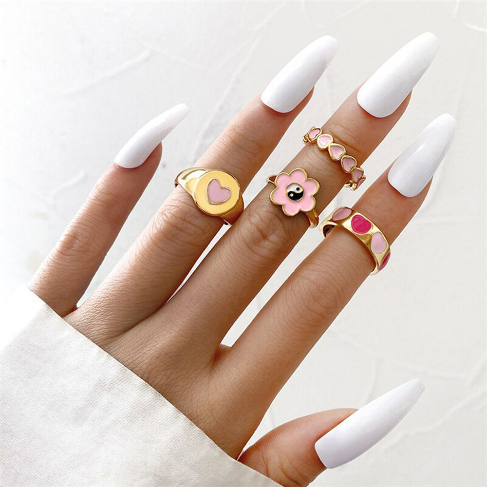 Jewels Galaxy Set Of 4 Gold-Plated Pink Enamelled Design Finger Ring