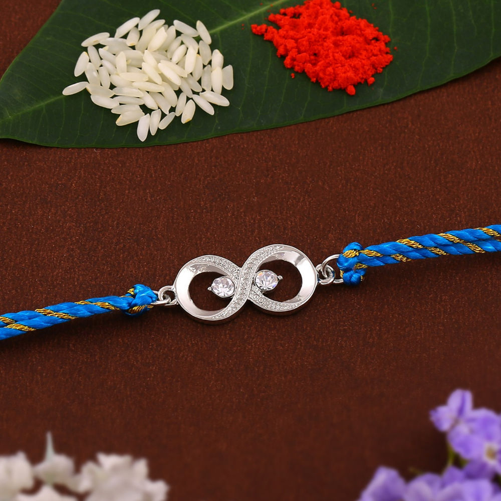 Estele Rodium Plated Eternal Knot Rakhi with Fancy Silk Thread and ...
