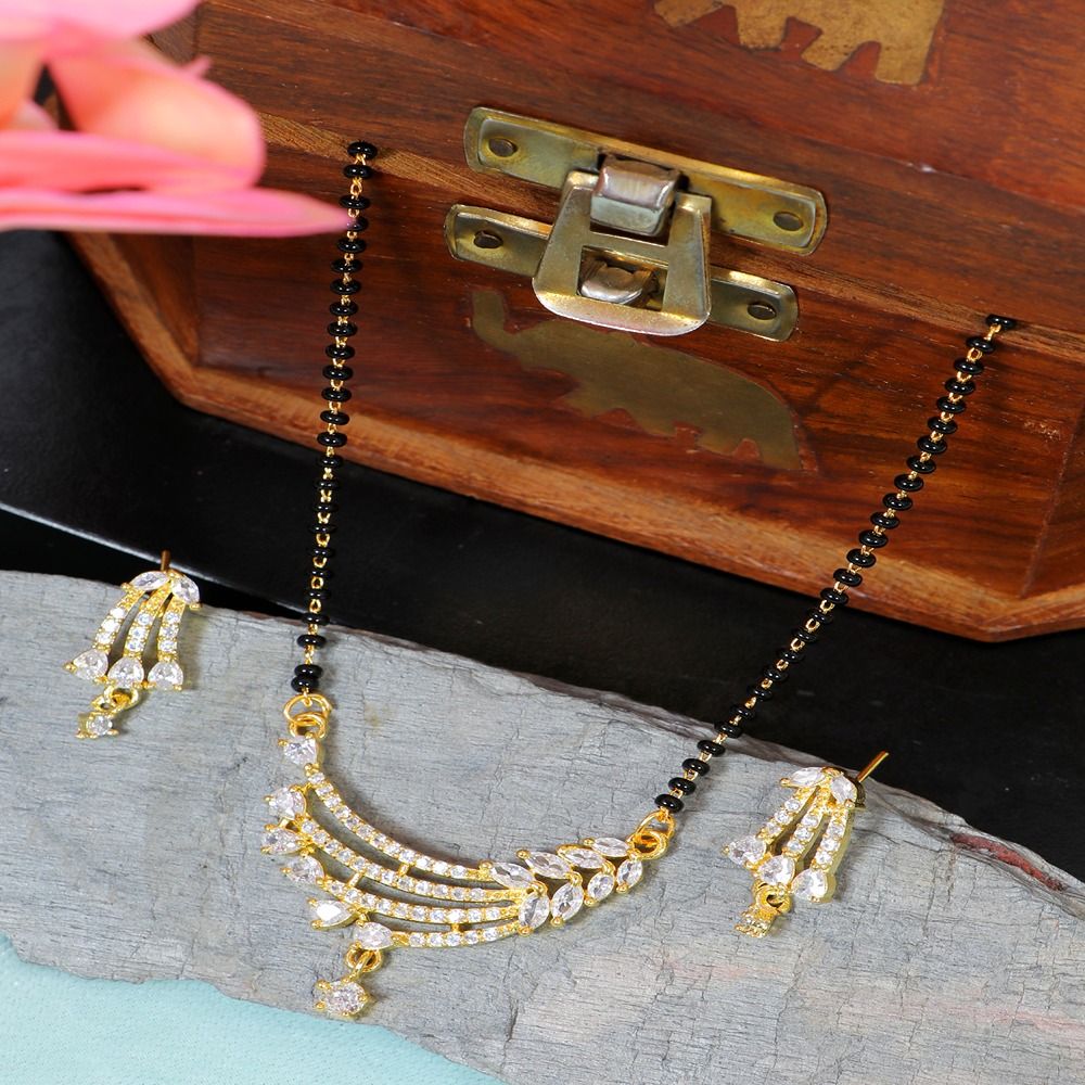 Crunchy Fashion Gold-Plated American Diamond/AD Studded Leaf Pattern ...